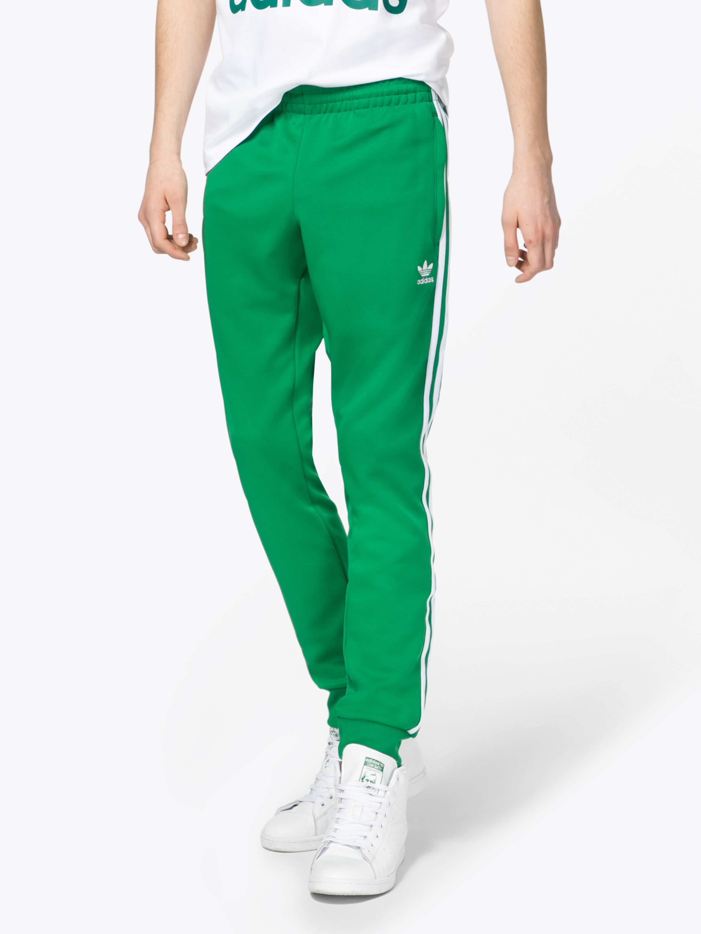 ADIDAS ORIGINALS Broek 'SST TP' in Groen | ABOUT YOU