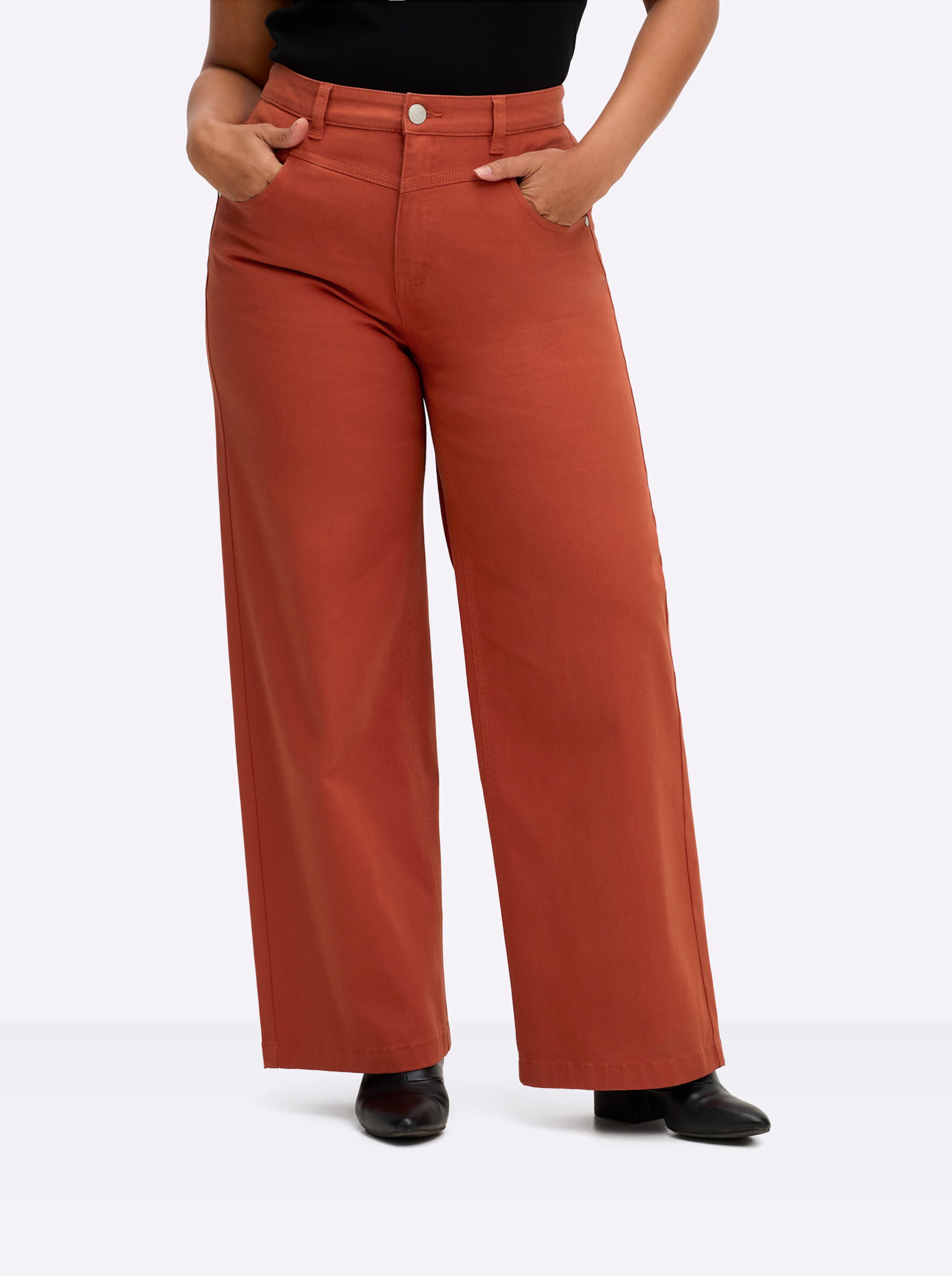 SHEEGO Szeroka nogawka Jeansy 'Ella' w kolorze Rdzawoczerwonym | ABOUT YOU