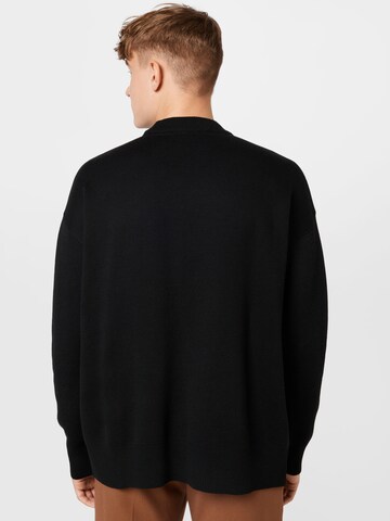 Pull-over 'Cosco' Carlo Colucci en Noir | ABOUT YOU