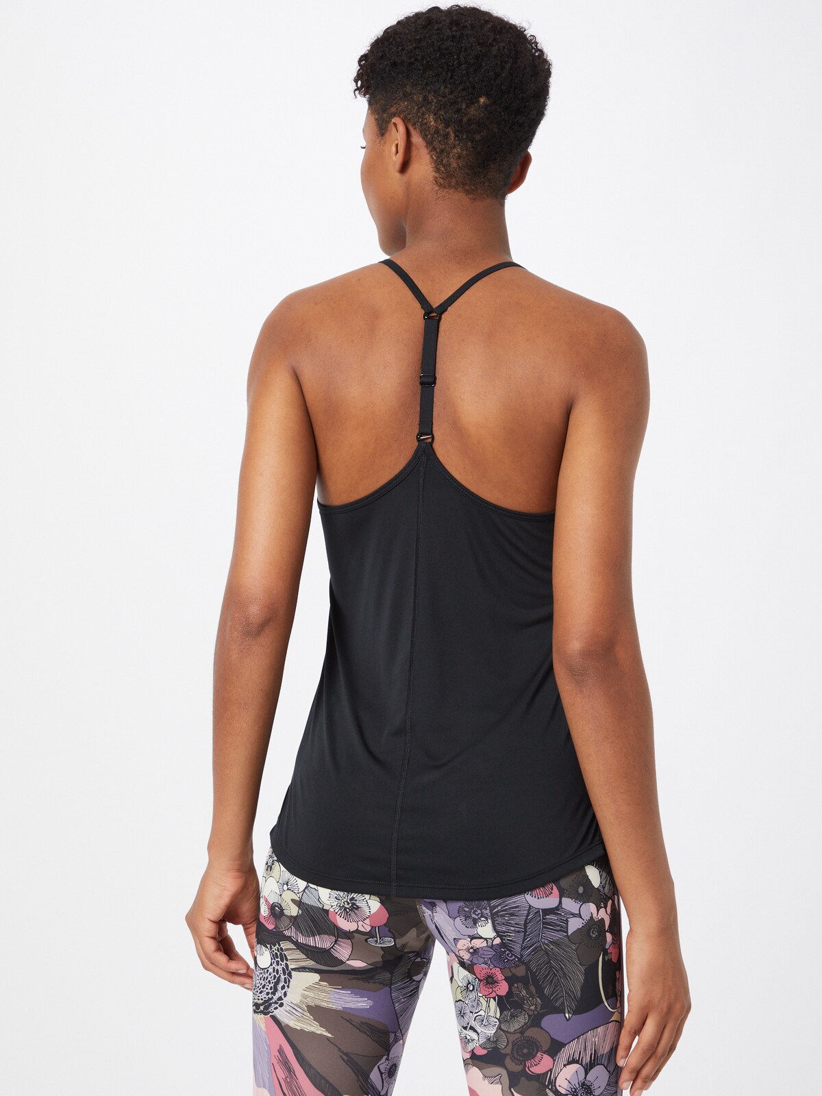 NIKE Sporttop in schwarz | ABOUT YOU